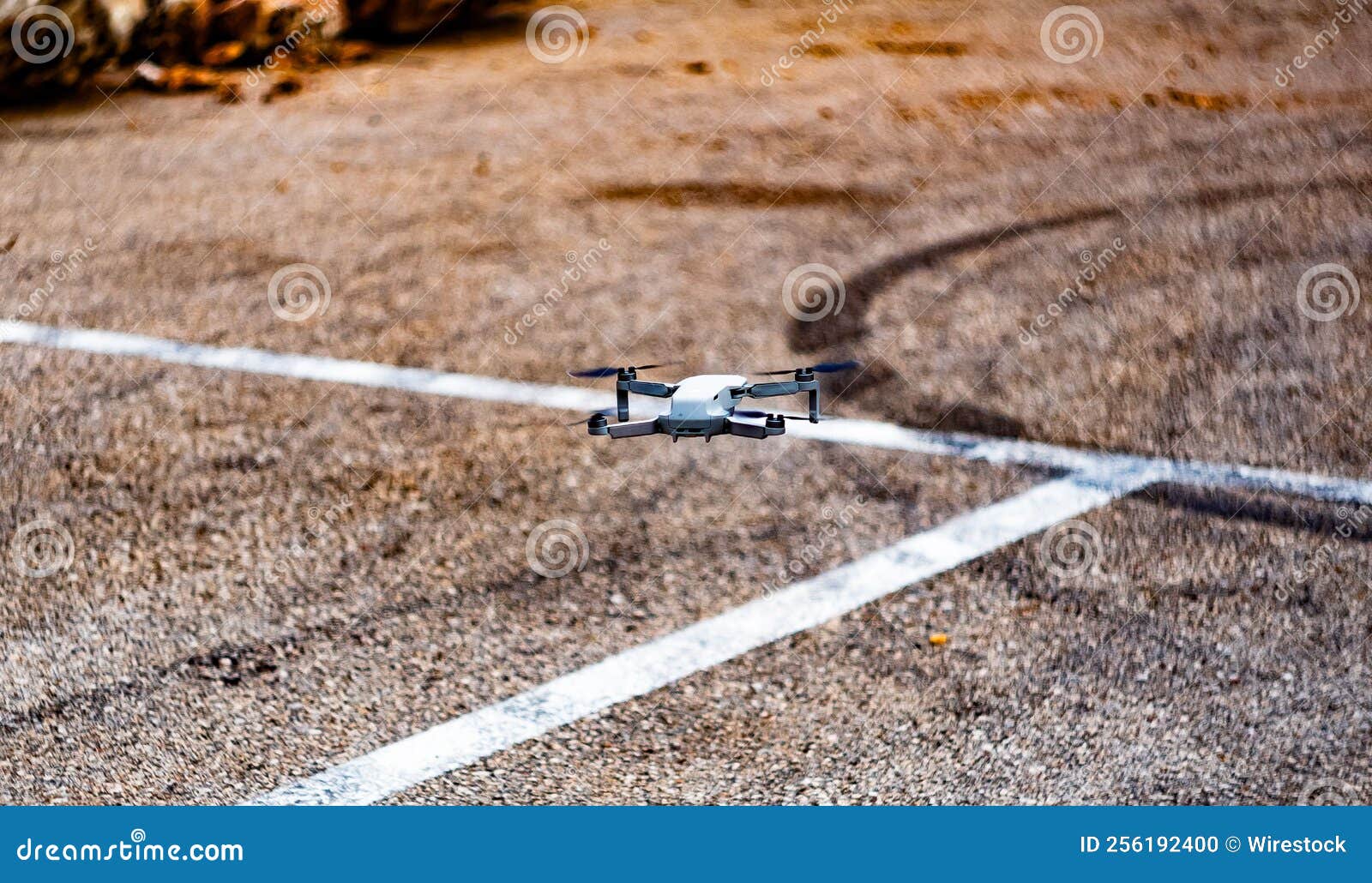 Flying Drone Over a Concrete Surface Stock Photo - Image of speed ...