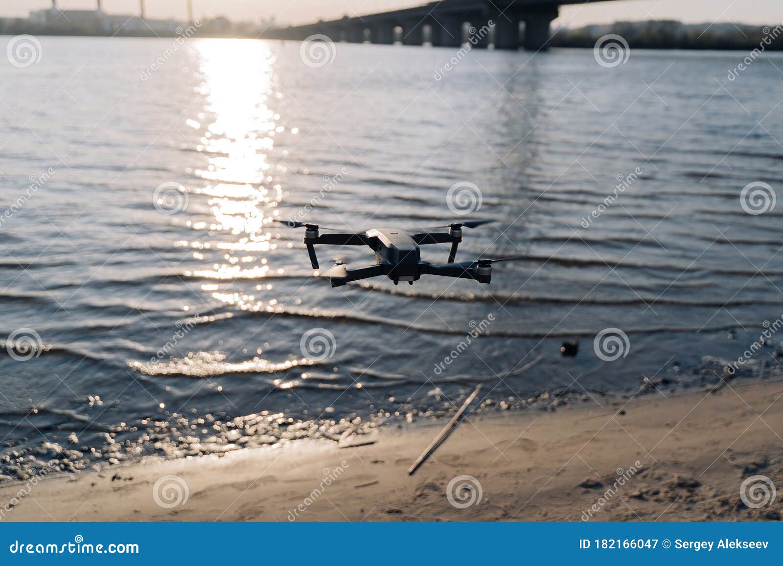 Flying Drone at Sunset Over the River Stock Image - Image of camera ...