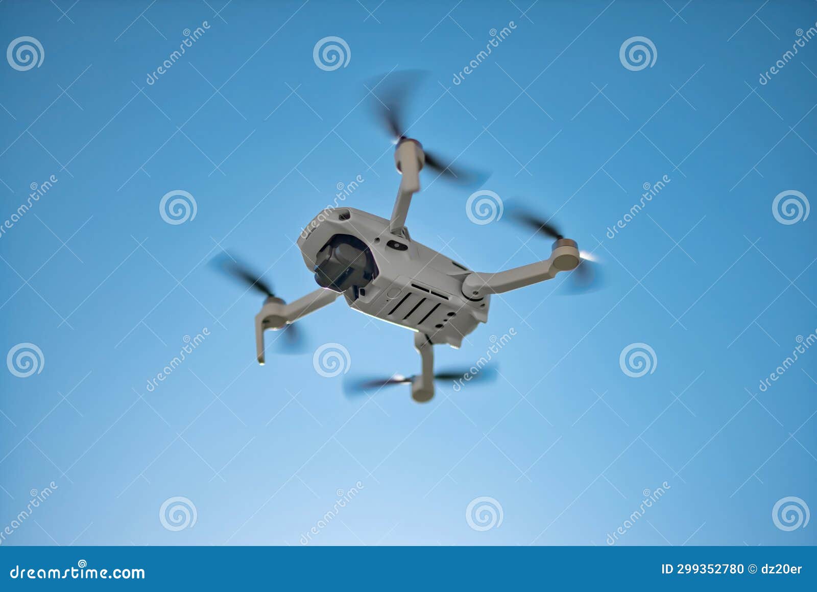 Flying Drone Underside with Teal Blue Sky Stock Photo - Image of remote ...