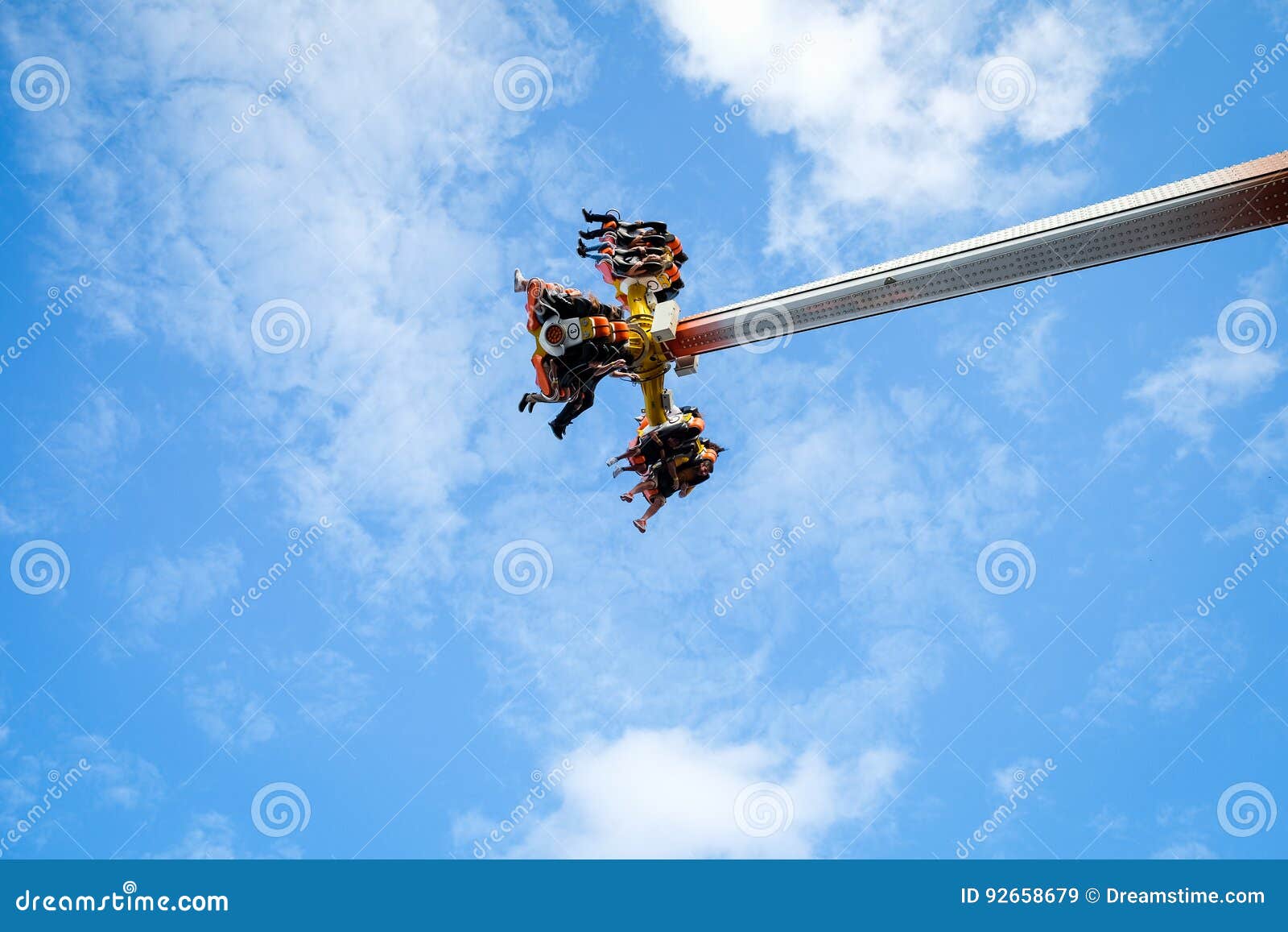 Flying on fair ride editorial stock image. Image of flying - 92658679