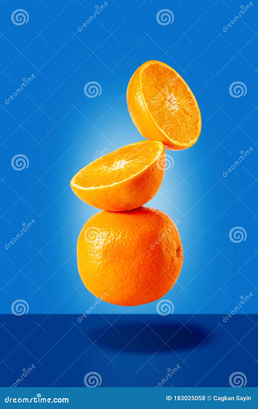 Flying Oranges on Blue Background Stock Photo - Image of stack, group ...