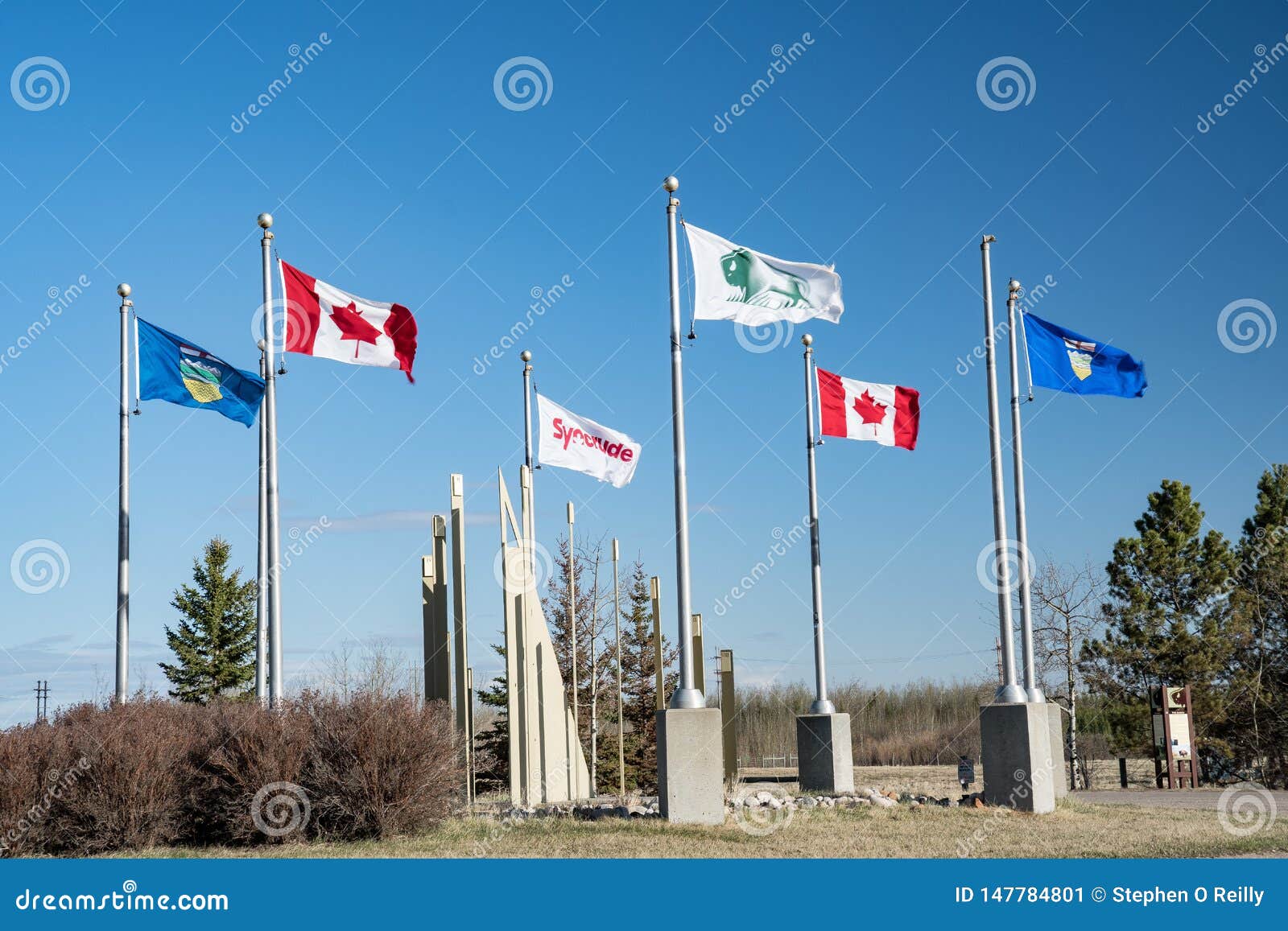 Flying the Flags at Syncrude Editorial Photo - Image of lake, flying ...