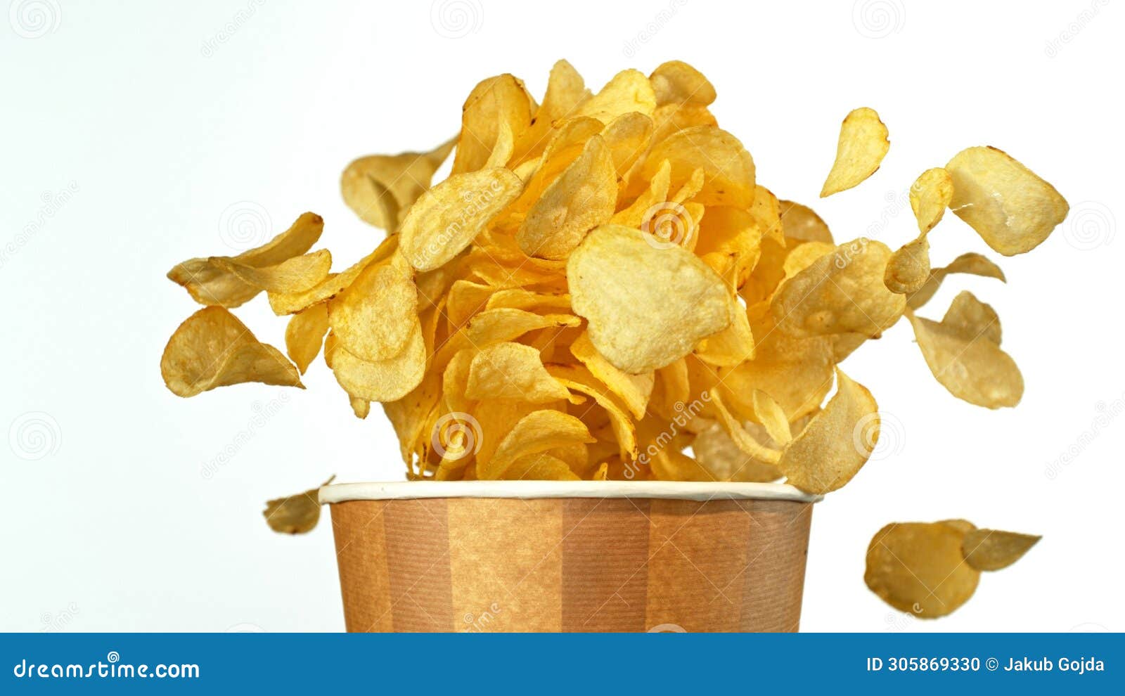 Flying Fried Potato Chips Exploding from Paper Bucket. Stock Photo ...