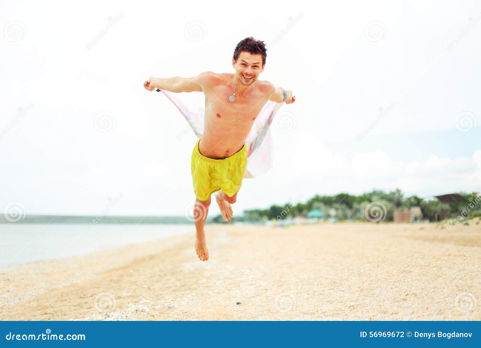 Flying Guy Having Fun on the Beach and Having a Good Time Stock Photo ...