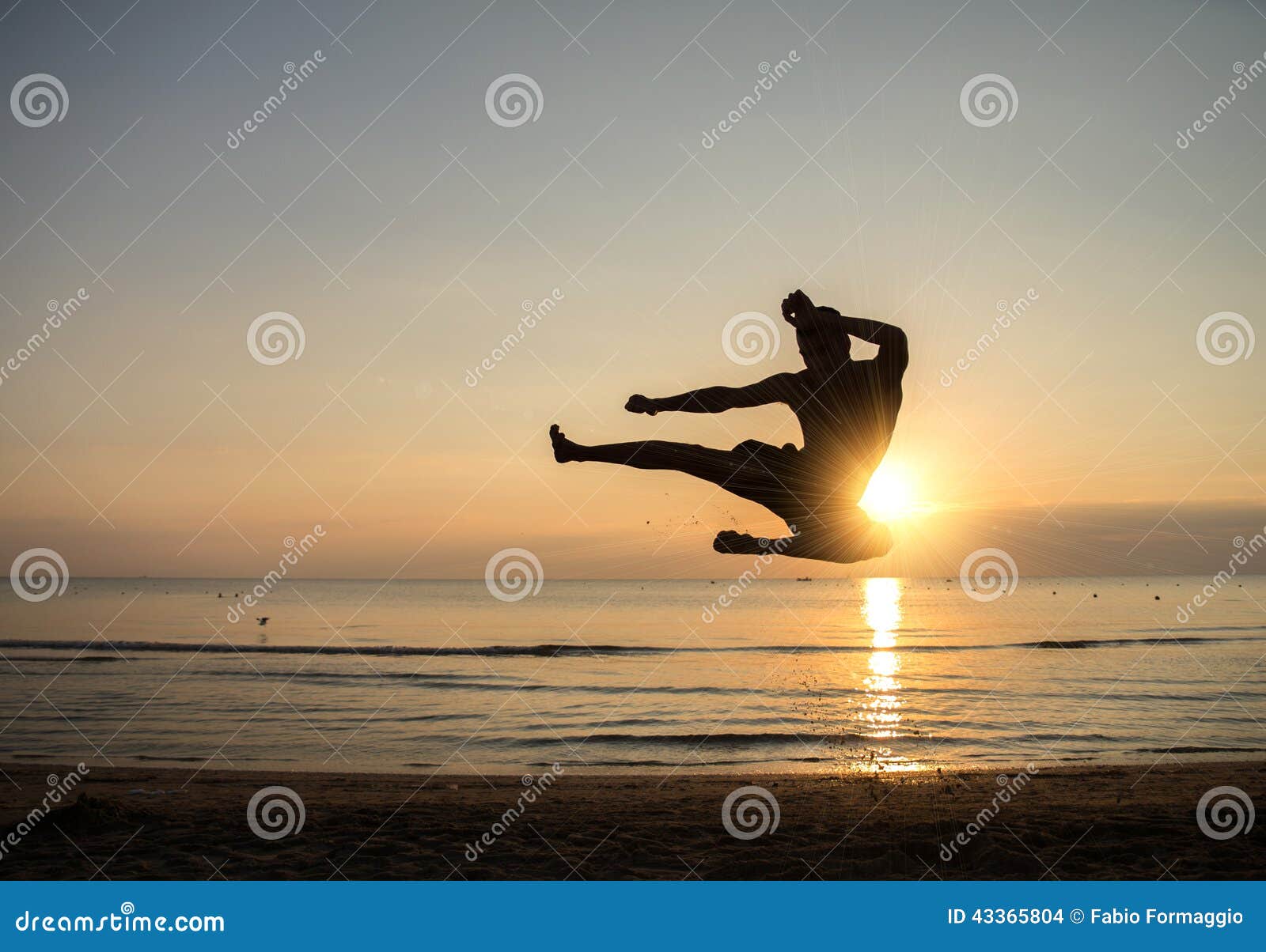 Flying High Kick at Sunrise Stock Photo - Image of defense, combat ...