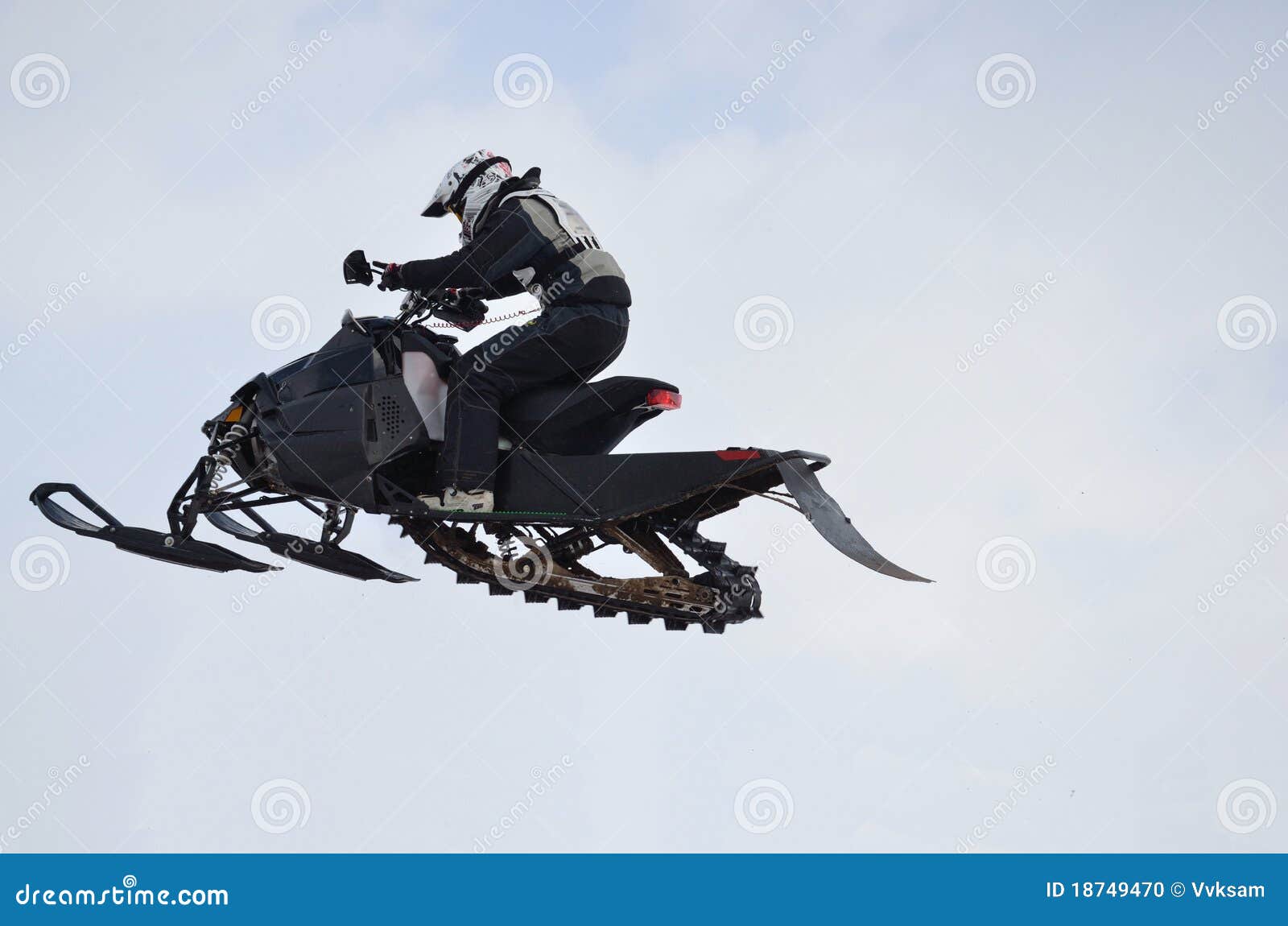 Flying High on a Snowmobile Rider Against the Sky Stock Photo - Image ...