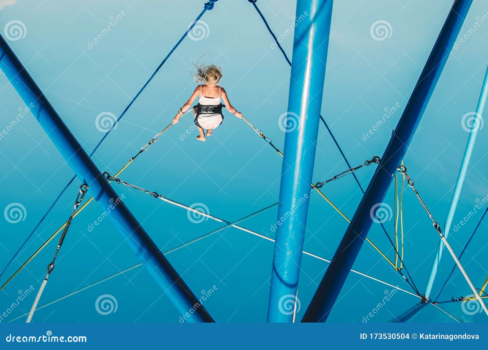 Flying High Up Side Down in Bungee Jumping Attraction Stock Photo ...