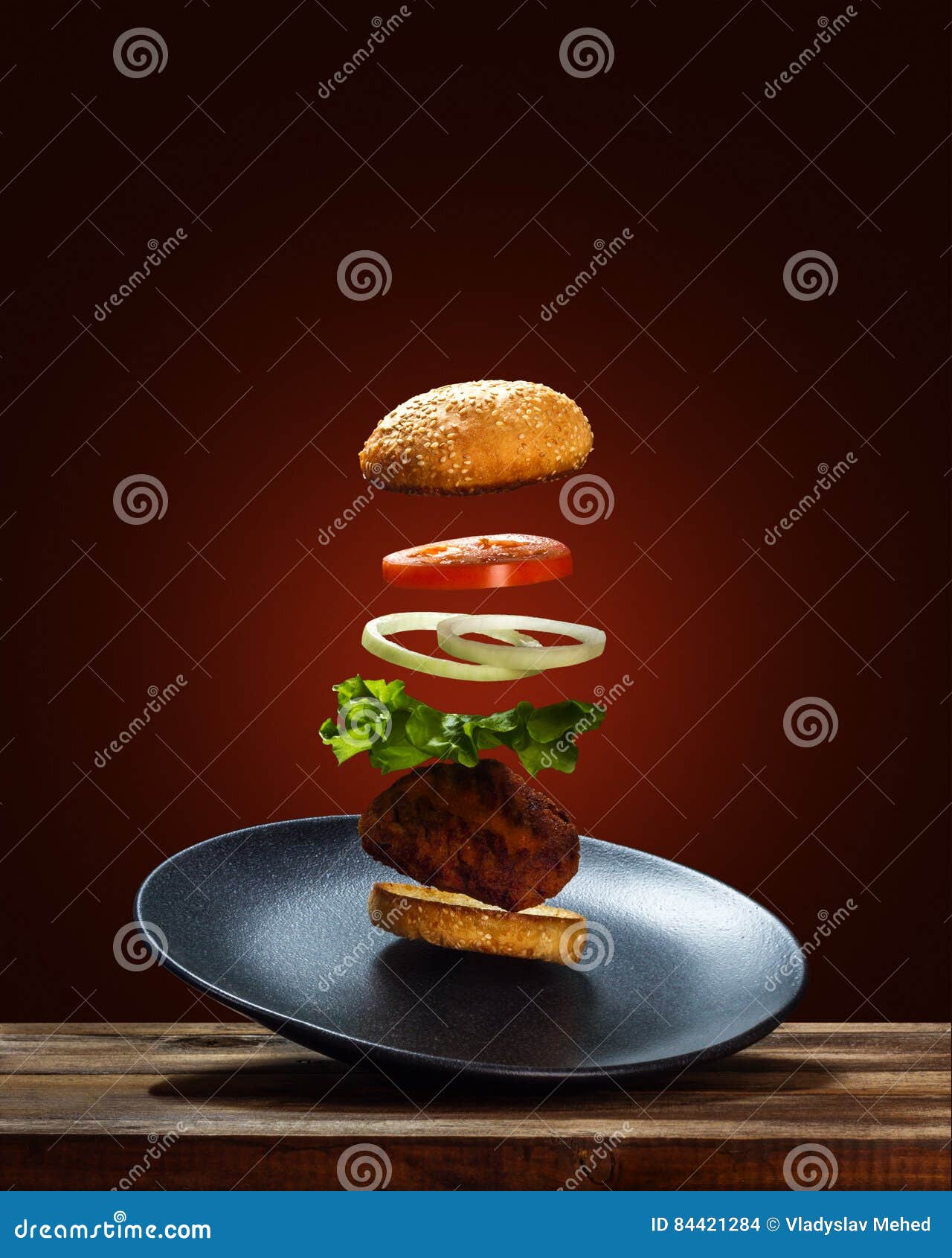 Flying Ingredients Burger stock photo. Image of lettuce - 84421284