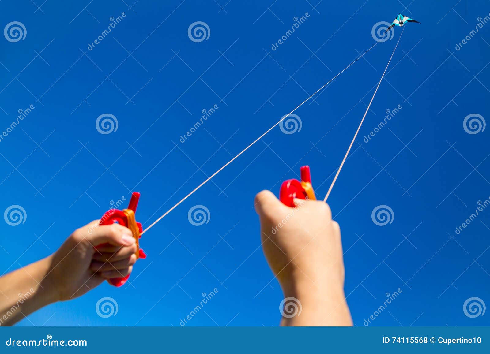 Flying kite stock photo. Image of hand, string, summer - 74115568