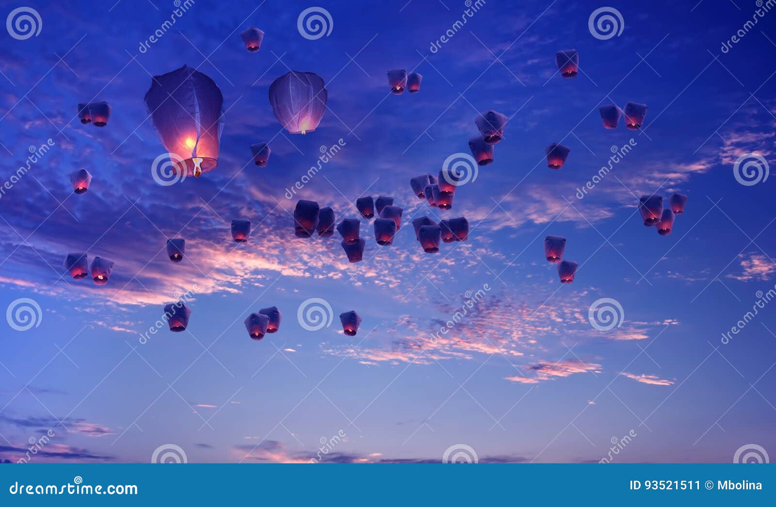 Flying lanterns in the sky stock image. Image of lantern - 93521511