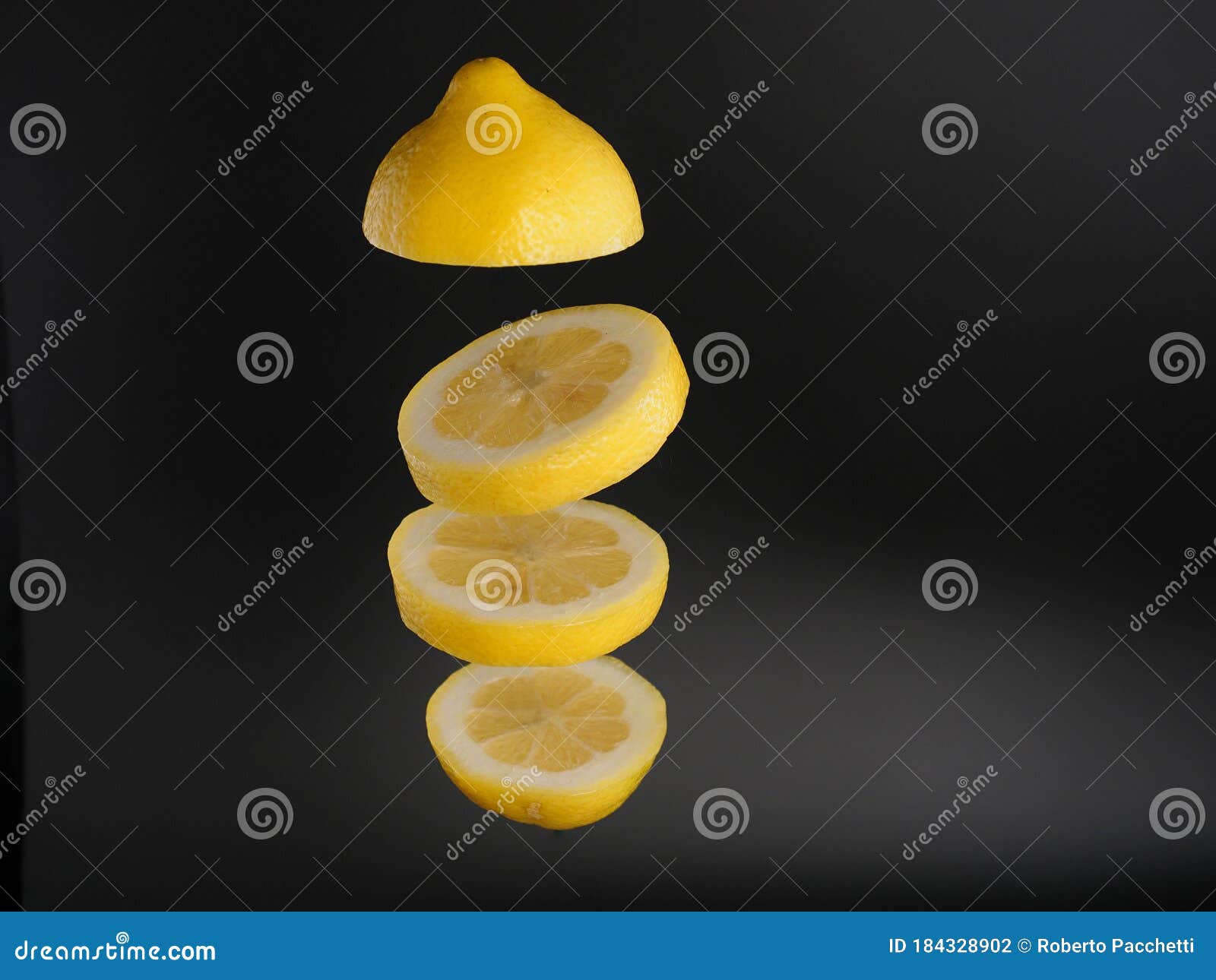 Flying Lemon Slices Over Dark Background Stock Photo - Image of leaf ...