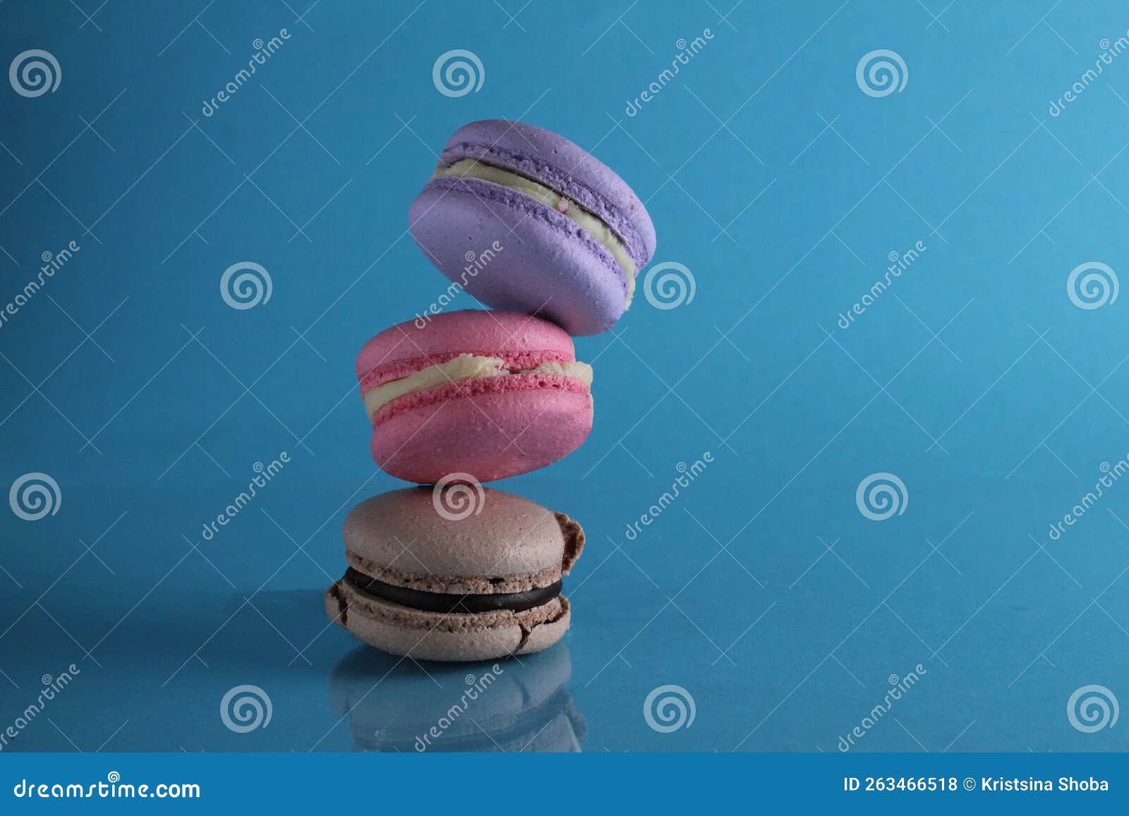 Flying Flying Levitating Food Macaroon on a Blue Background with Room ...