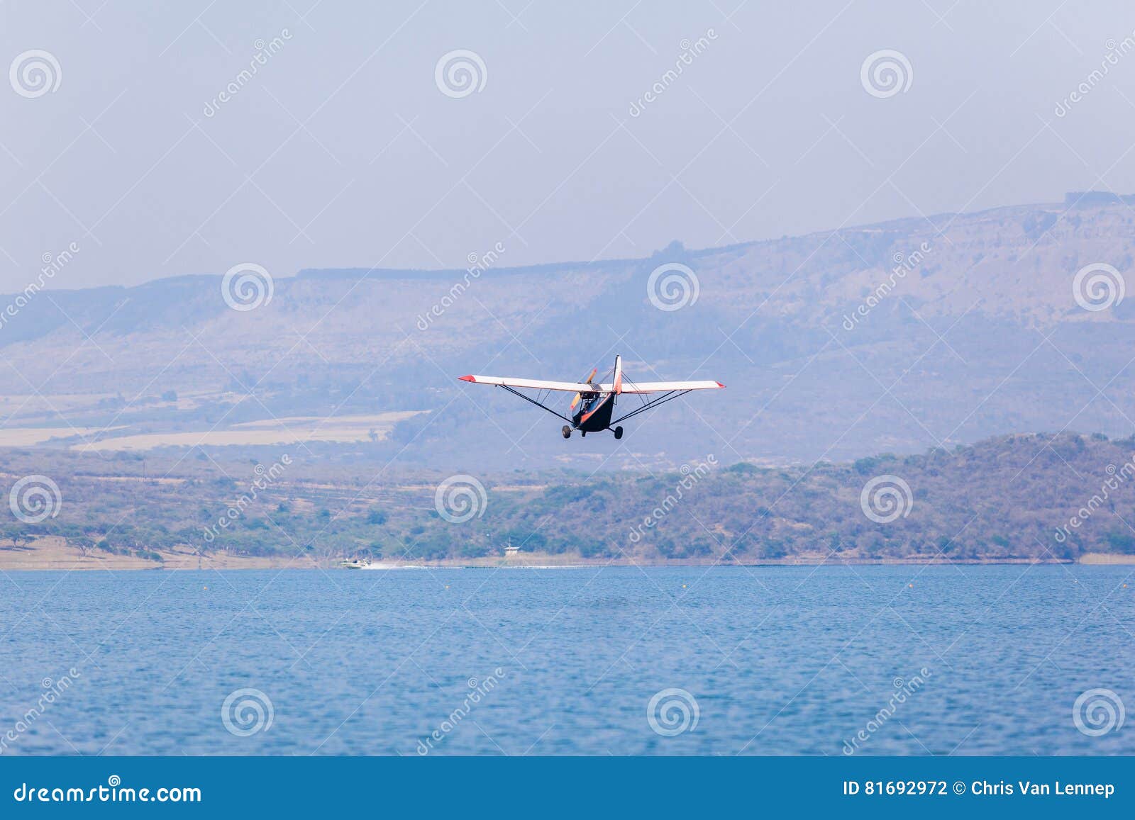 Flying Low Plane Waters stock photo. Image of africa - 81692972