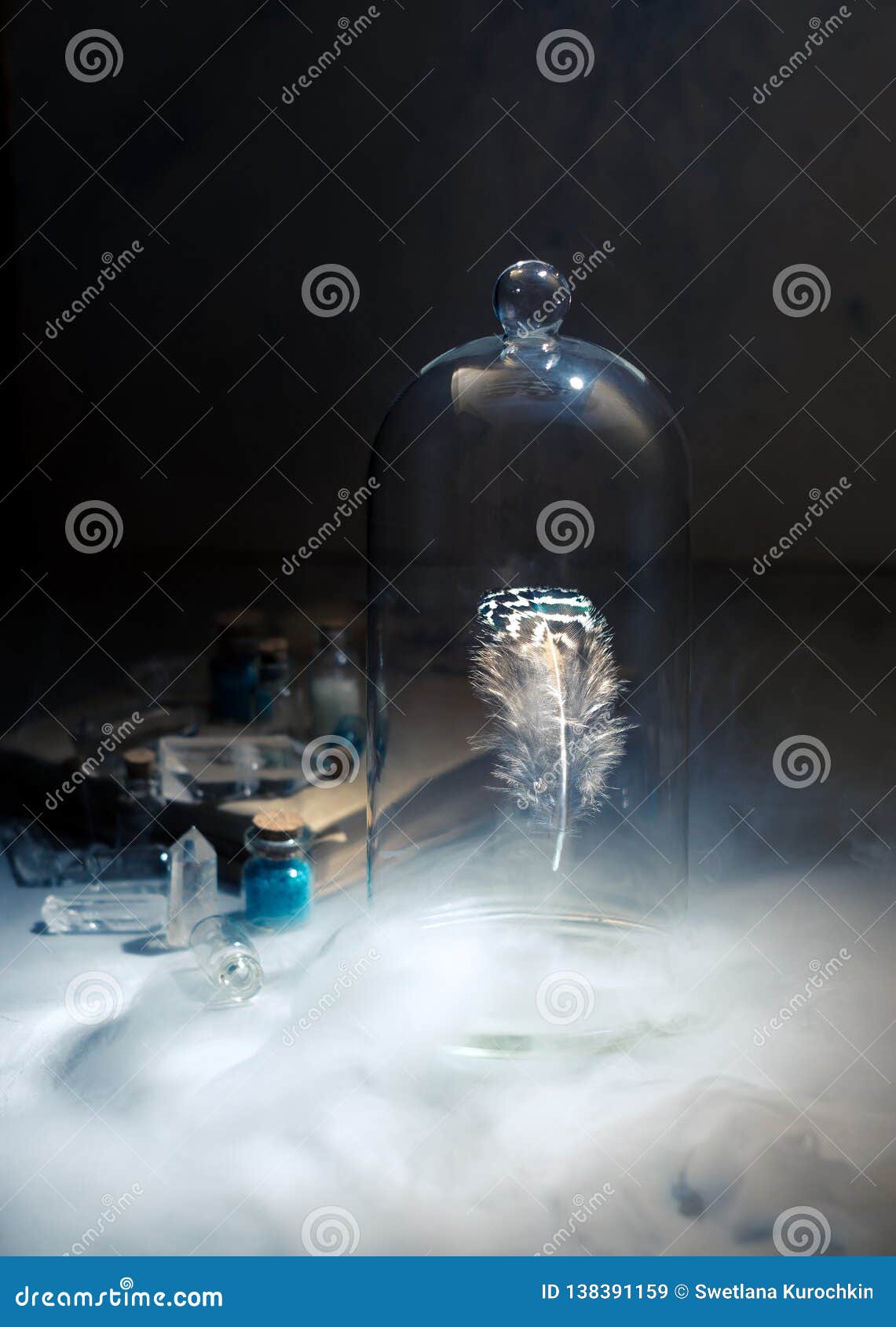 Flying Magical Feather Under a Glass Dome Stock Image - Image of bottle ...