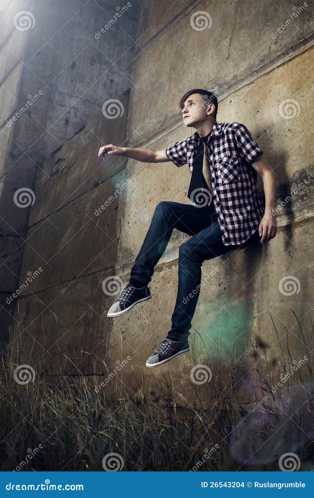 Flying Man Trying To Reach the Light Stock Photo - Image of movement ...