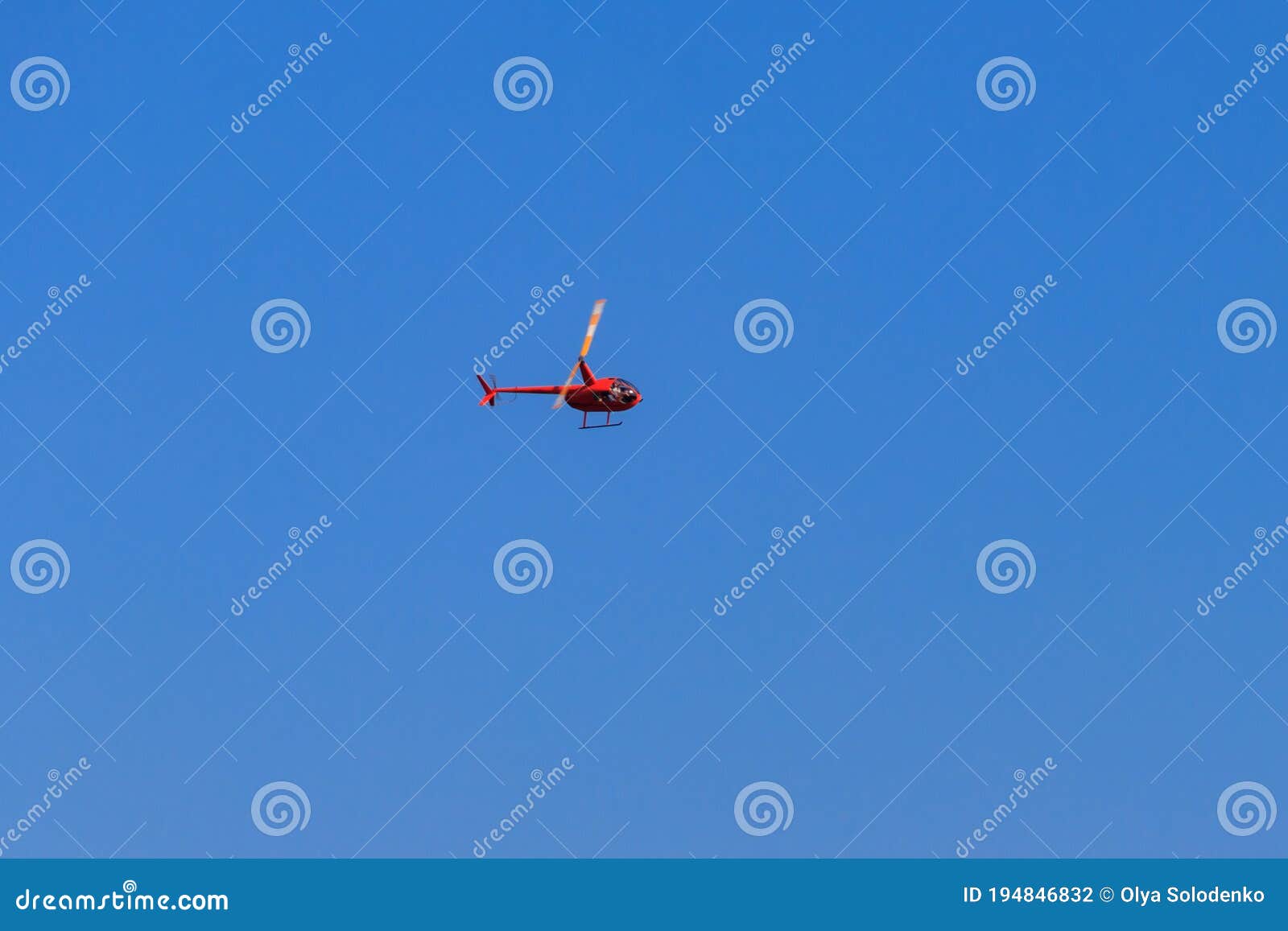 Flying Orange Helicopter in Blue Sky Stock Photo - Image of machine ...