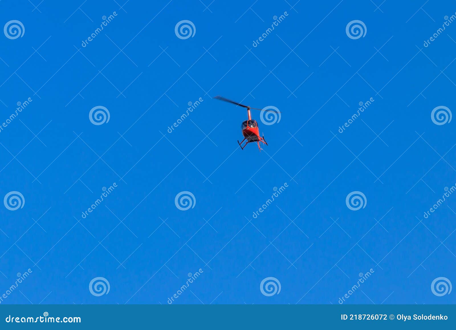 Flying Orange Helicopter in Blue Sky Stock Photo - Image of flying ...