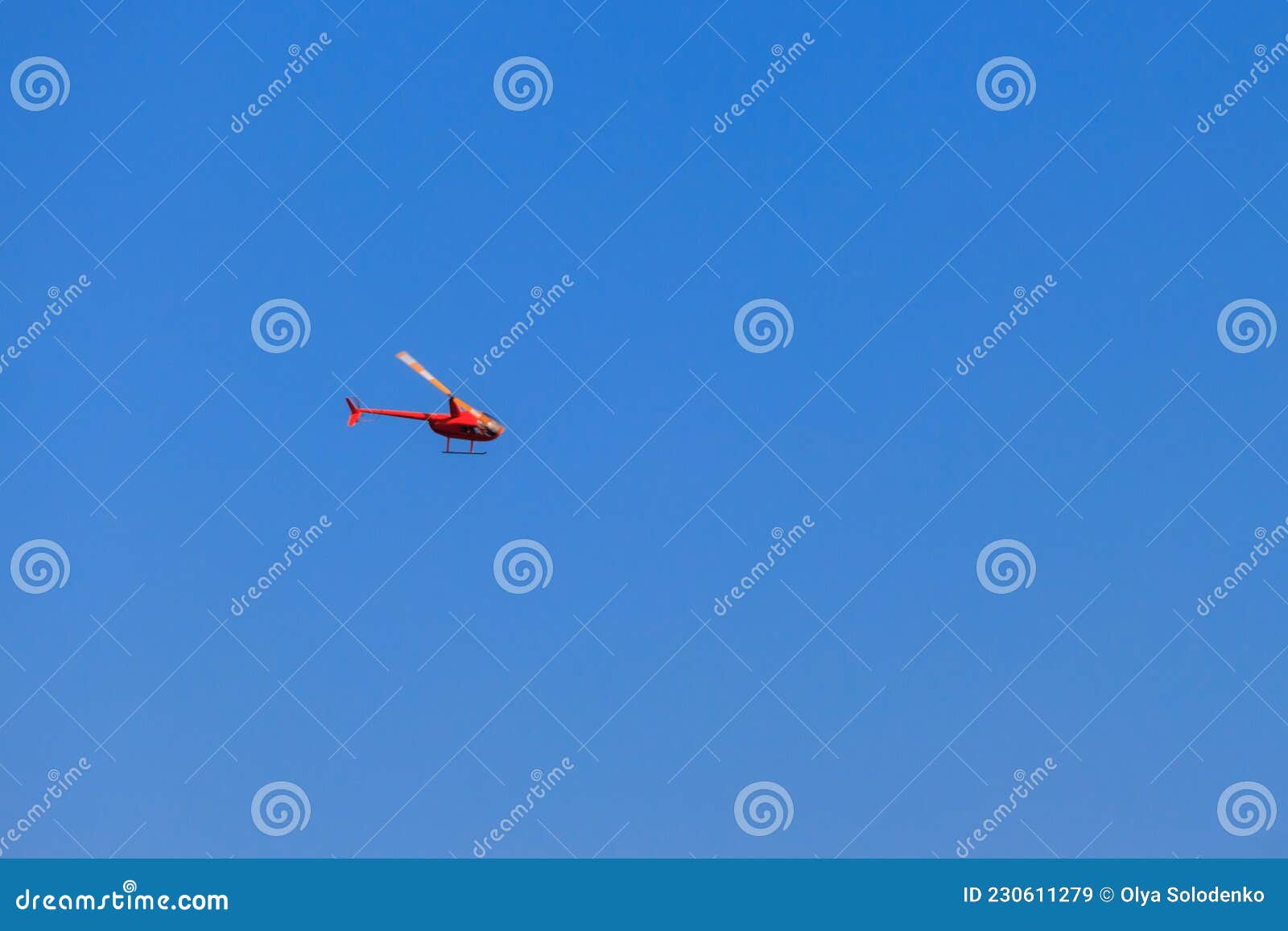 Flying Orange Helicopter in Blue Sky Stock Image - Image of orange ...