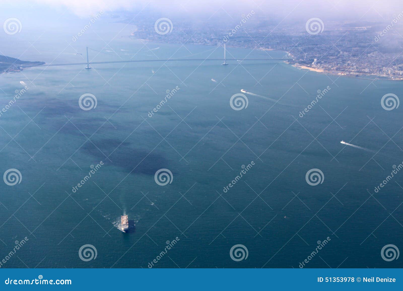 Flying into Osaka Over the Bridge Stock Photo - Image of clouds ...