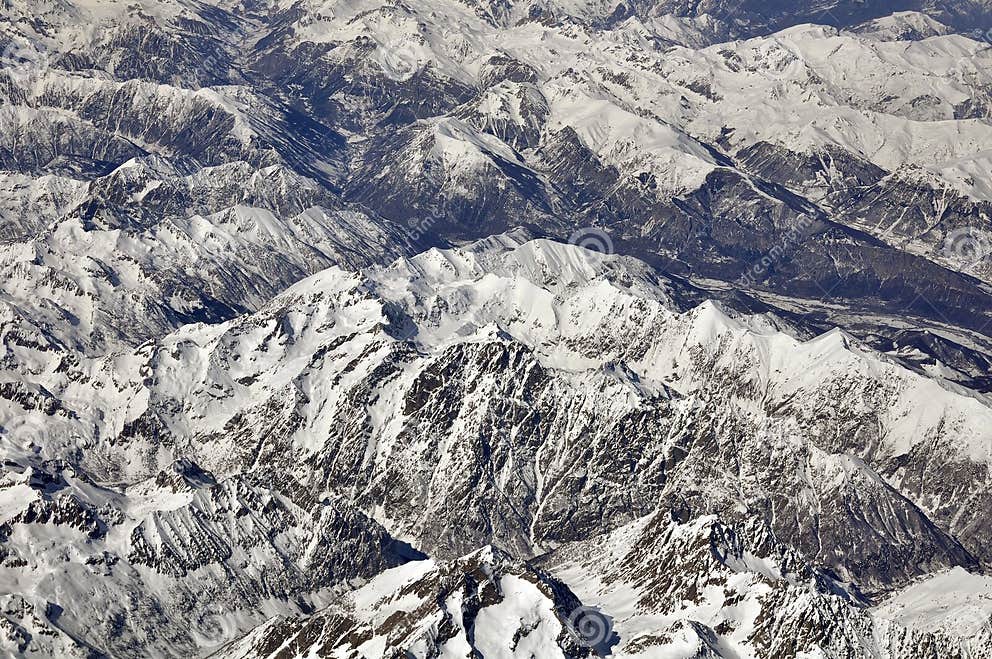 Flying over the Alps stock photo. Image of view, aeronautical - 19330946