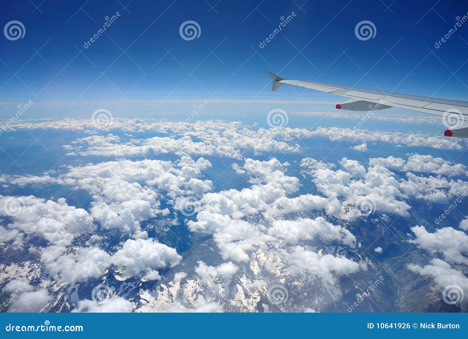 Flying over mountains stock photo. Image of aviation - 10641926