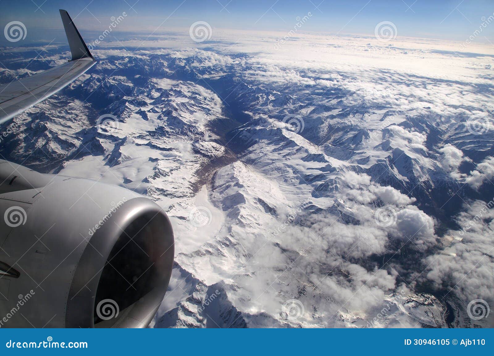 Flying over mountains stock image. Image of mountains - 30946105