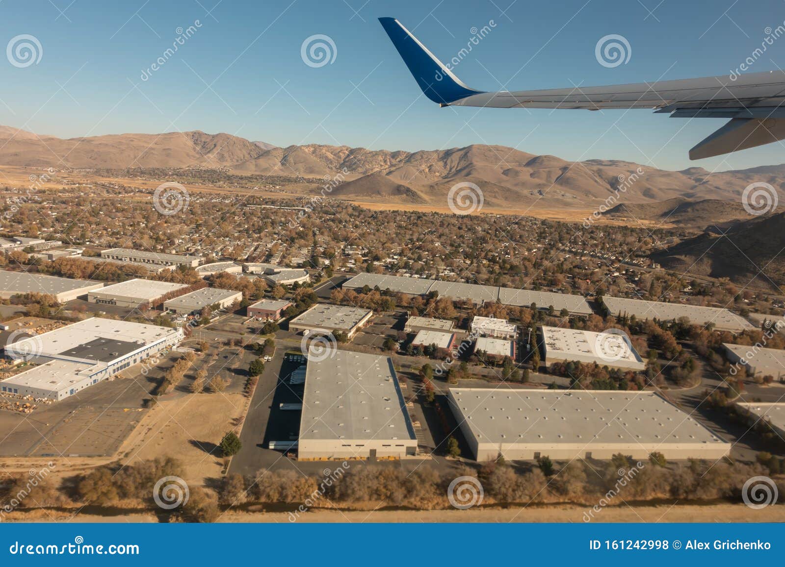 Flying Over Reno Nevada and the Rockies Stock Photo - Image of dusk ...
