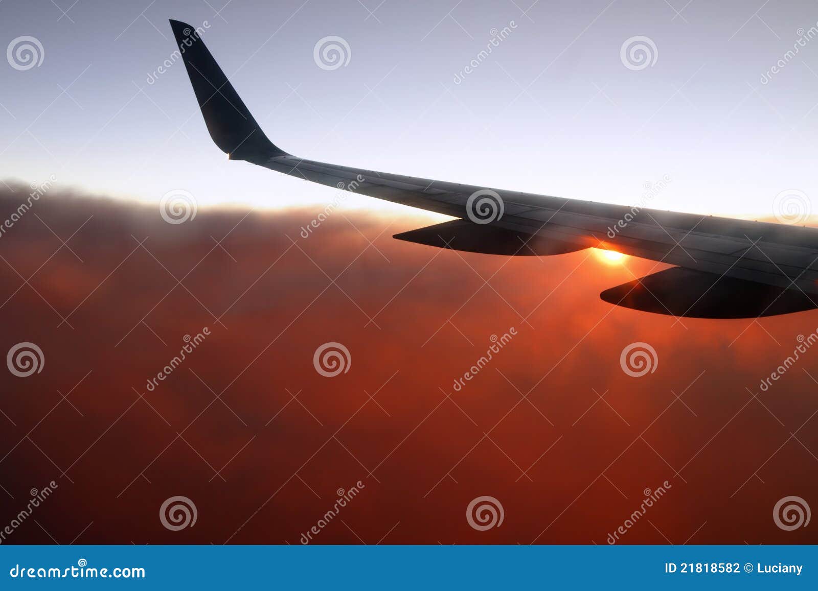 Flying Over the Sunset stock photo. Image of airplane - 21818582