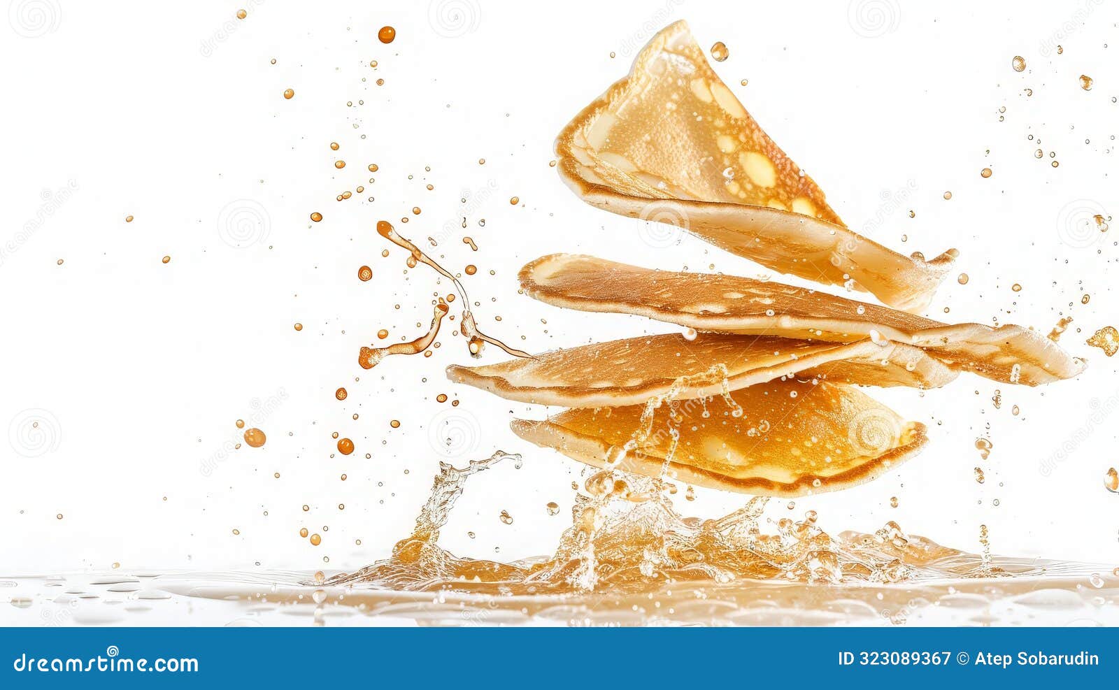 Flying Pancakes Splashing into Syrup Stock Image - Image of flying ...