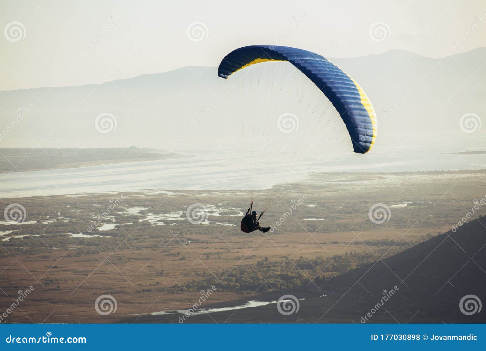 Flying paraglider. stock photo. Image of flying, jump - 177030898