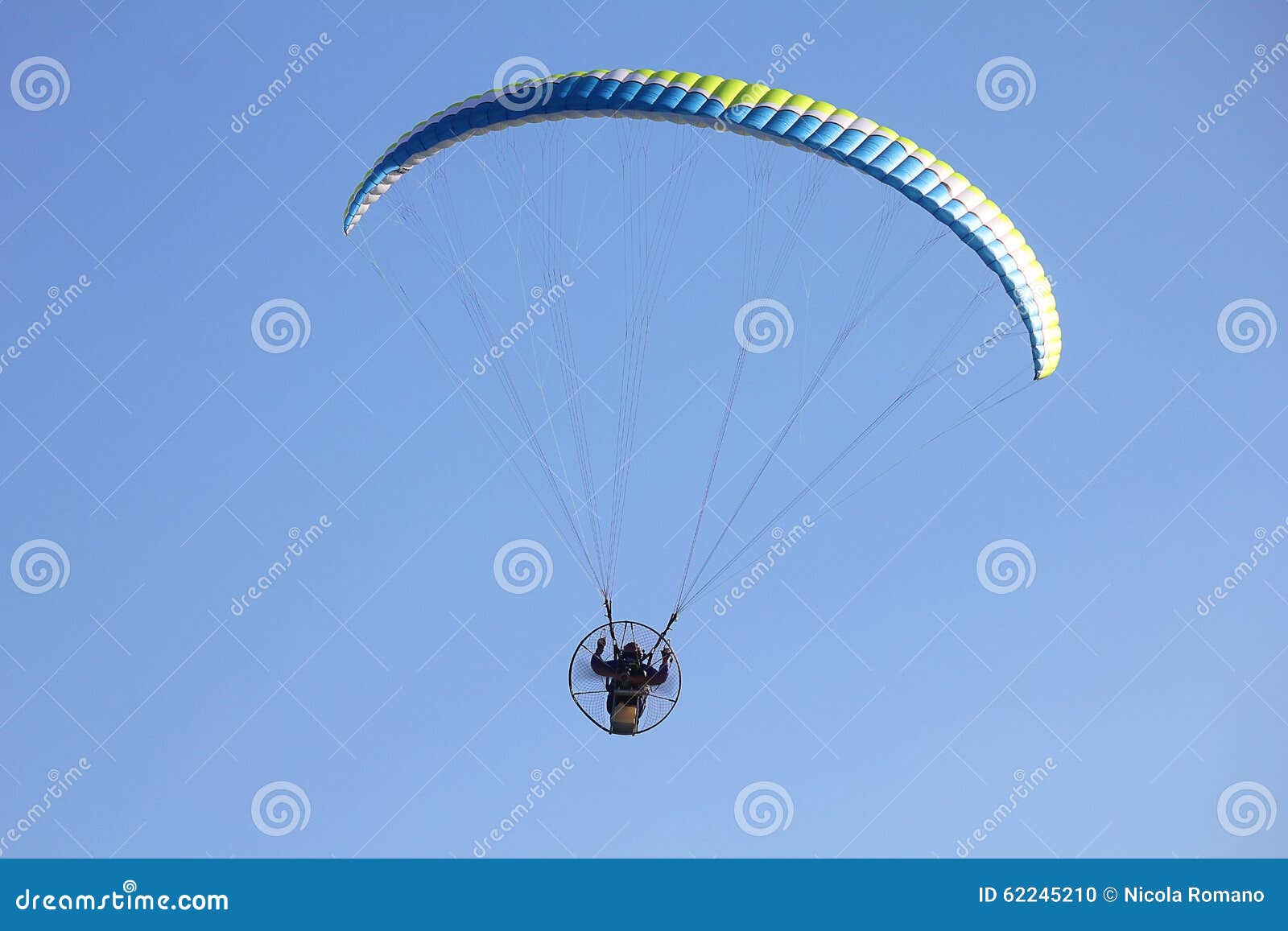 Flying Paragliders in the Sky Stock Photo - Image of wings, paramotor ...