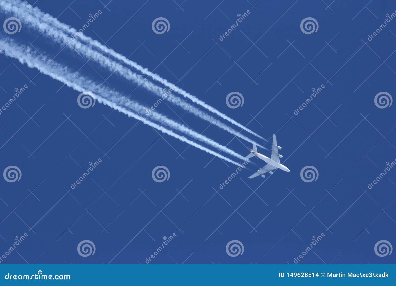 Flying plane on blue sky stock photo. Image of summer - 149628514