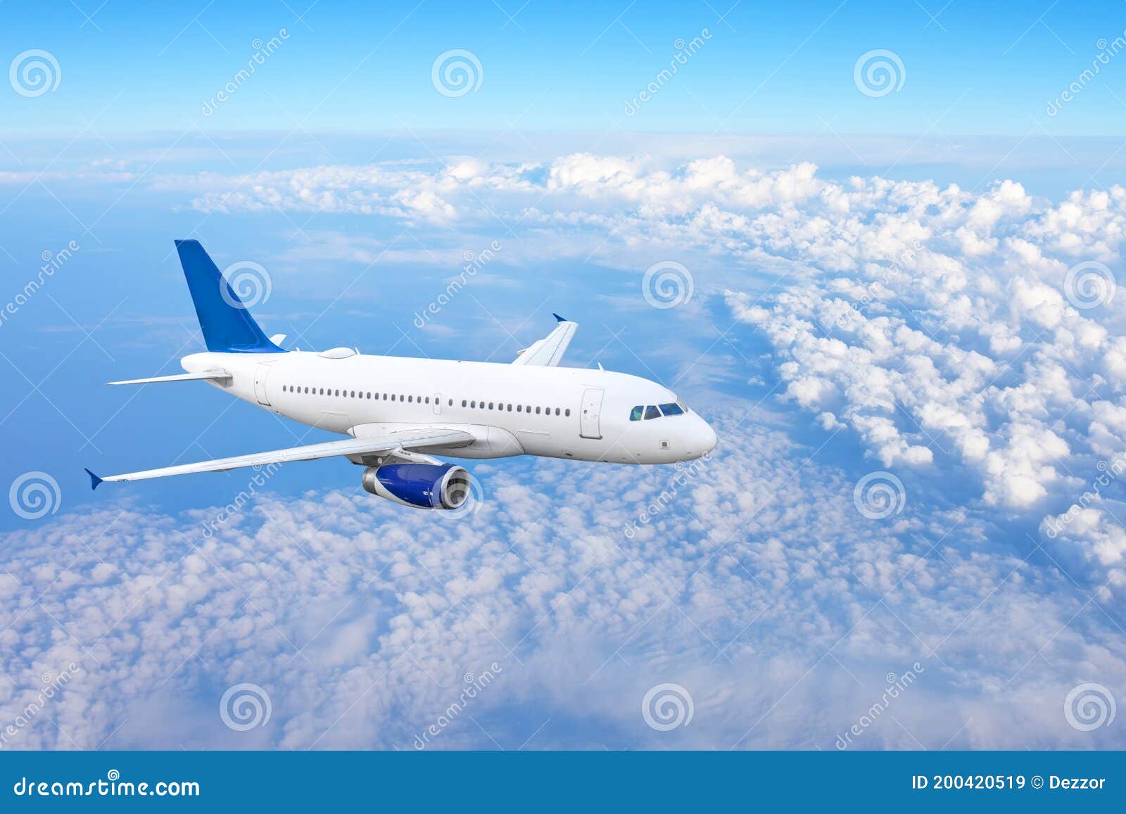 Flying Plane High in the Sky Above the Clouds Stock Image - Image of ...