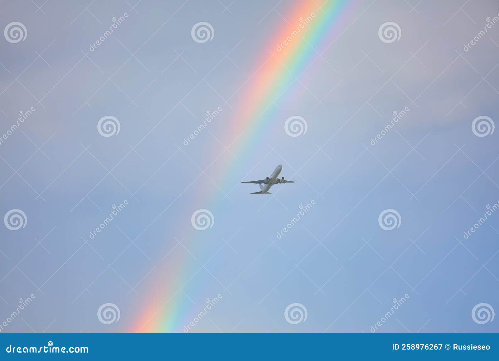 Flying plane and rainbow stock image. Image of aircraft - 258976267