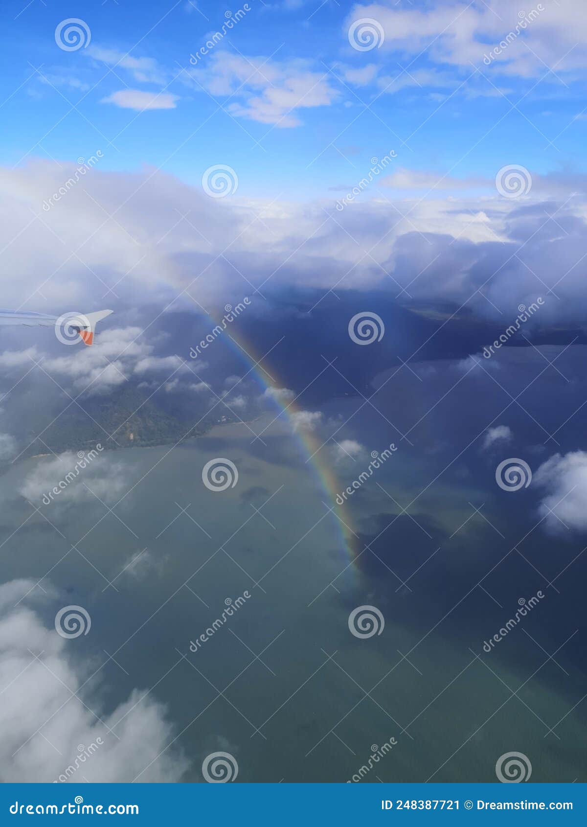 Flying through a rainbow stock image. Image of plain - 248387721