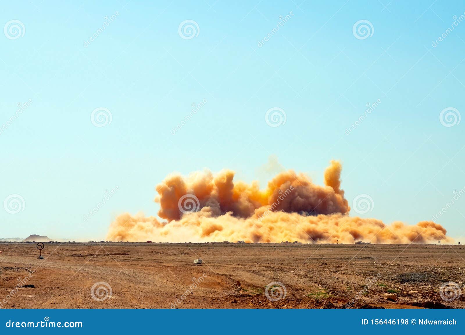 Flying Rocks and Dust Clouds during Detonator Blast Stock Photo - Image ...