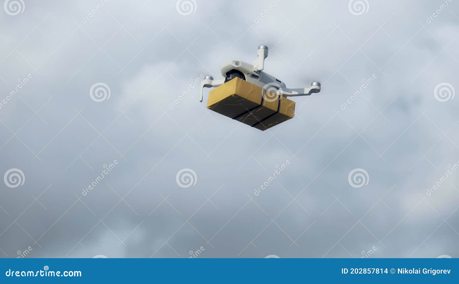 Flying on a Sky Delivery Drone with Holding a .cardboard Parcel Stock ...