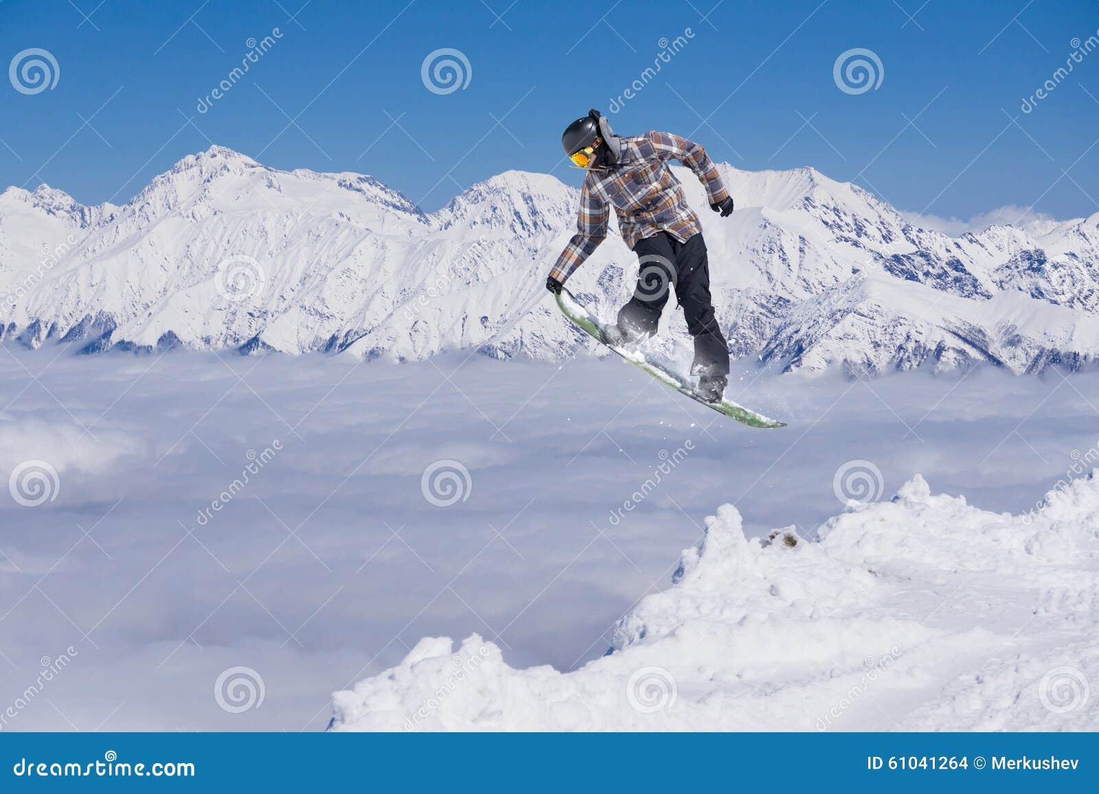Flying Snowboarder on Mountains Stock Photo - Image of jump, snowboard ...