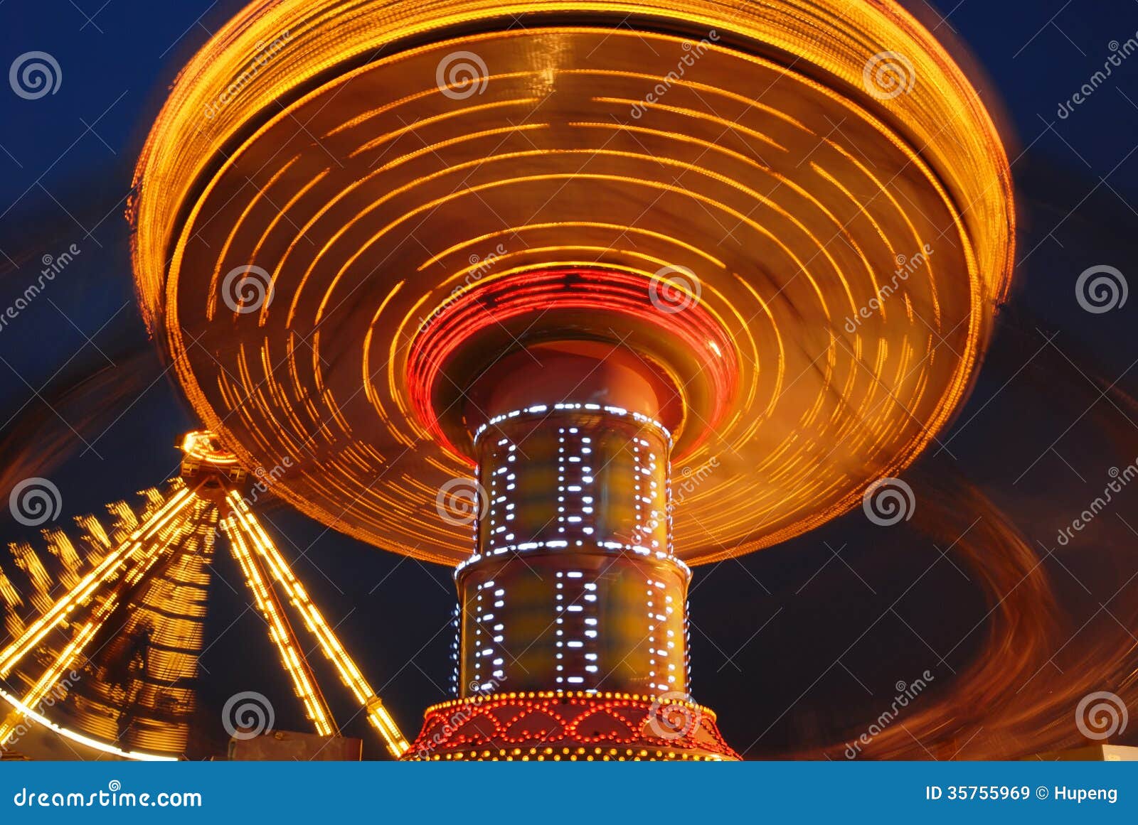 Flying swing at night stock image. Image of colors, enjoyment - 35755969
