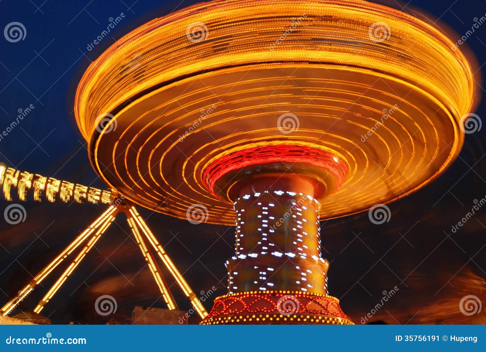 Flying swing at night stock image. Image of amusement - 35756191