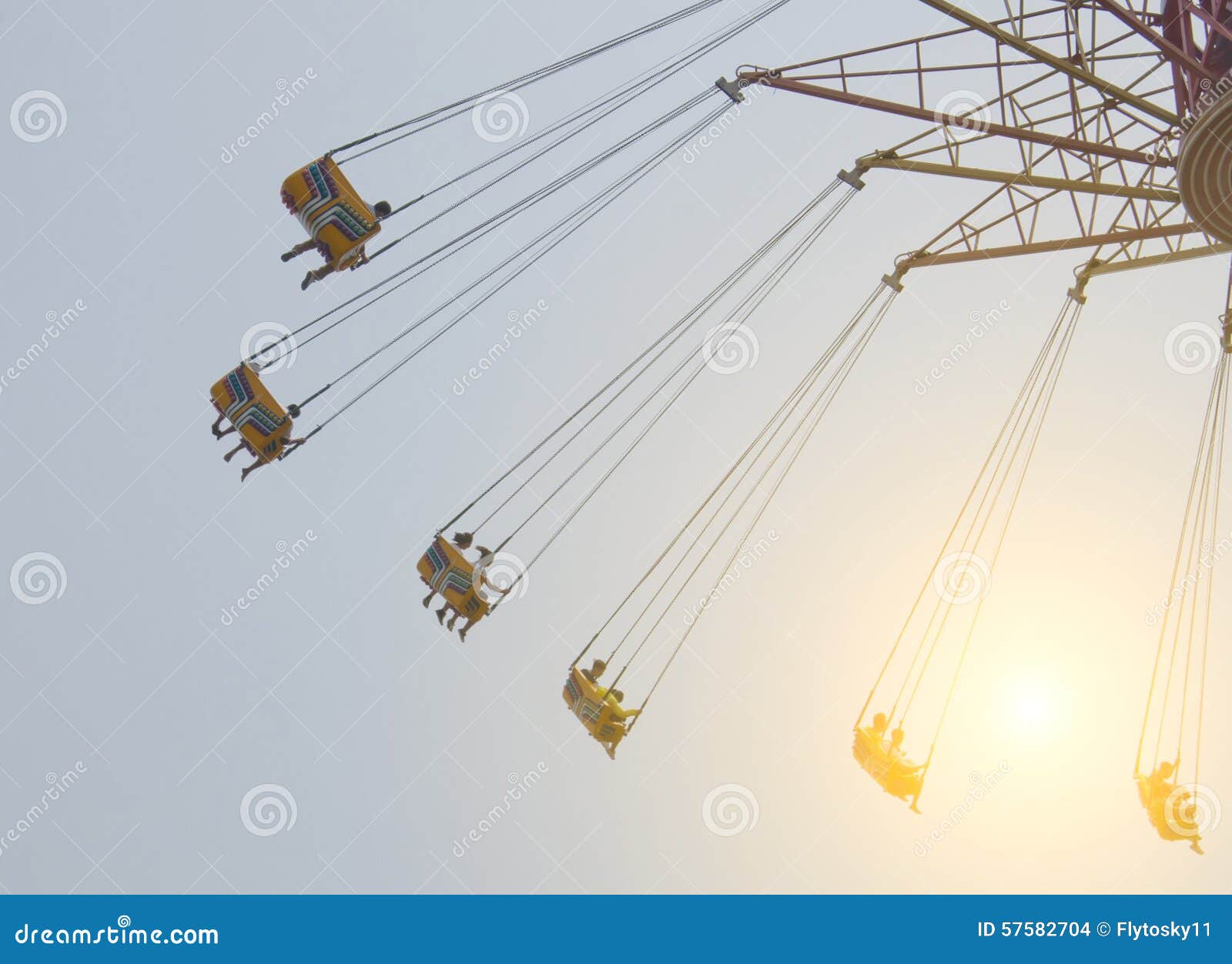 Flying swing in theme park editorial stock image. Image of blue - 57582704