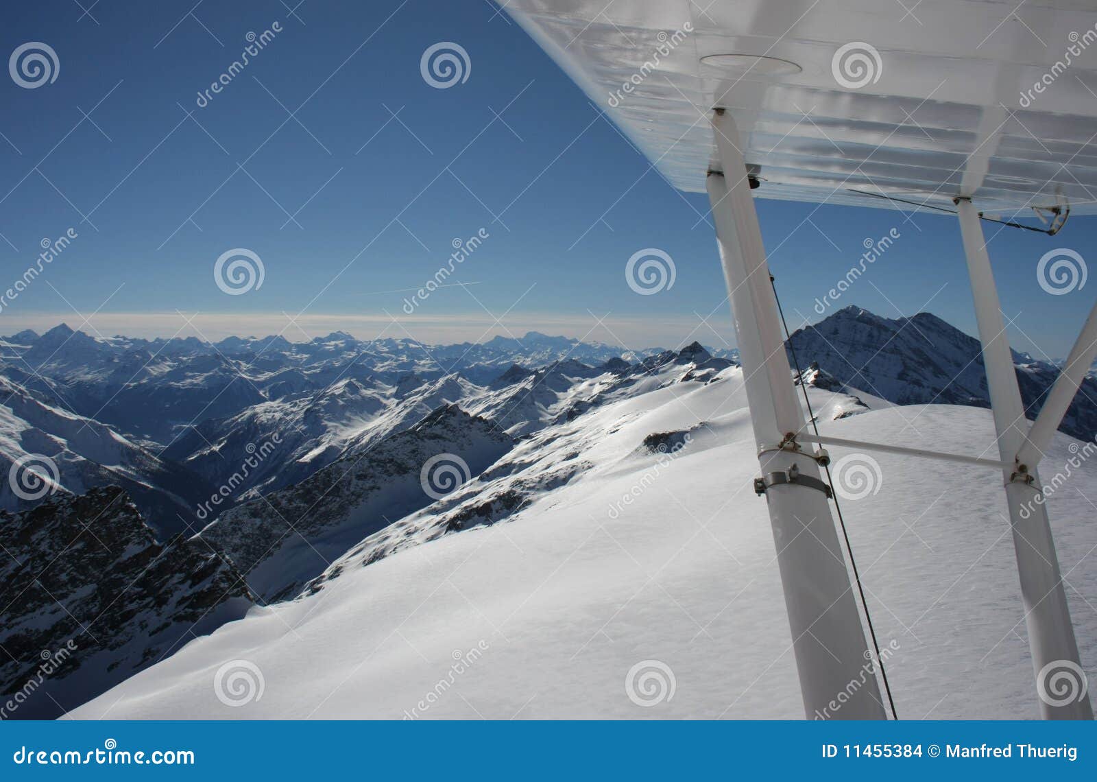 Flying in the Swiss Alps in Winter Stock Photo - Image of holiday ...