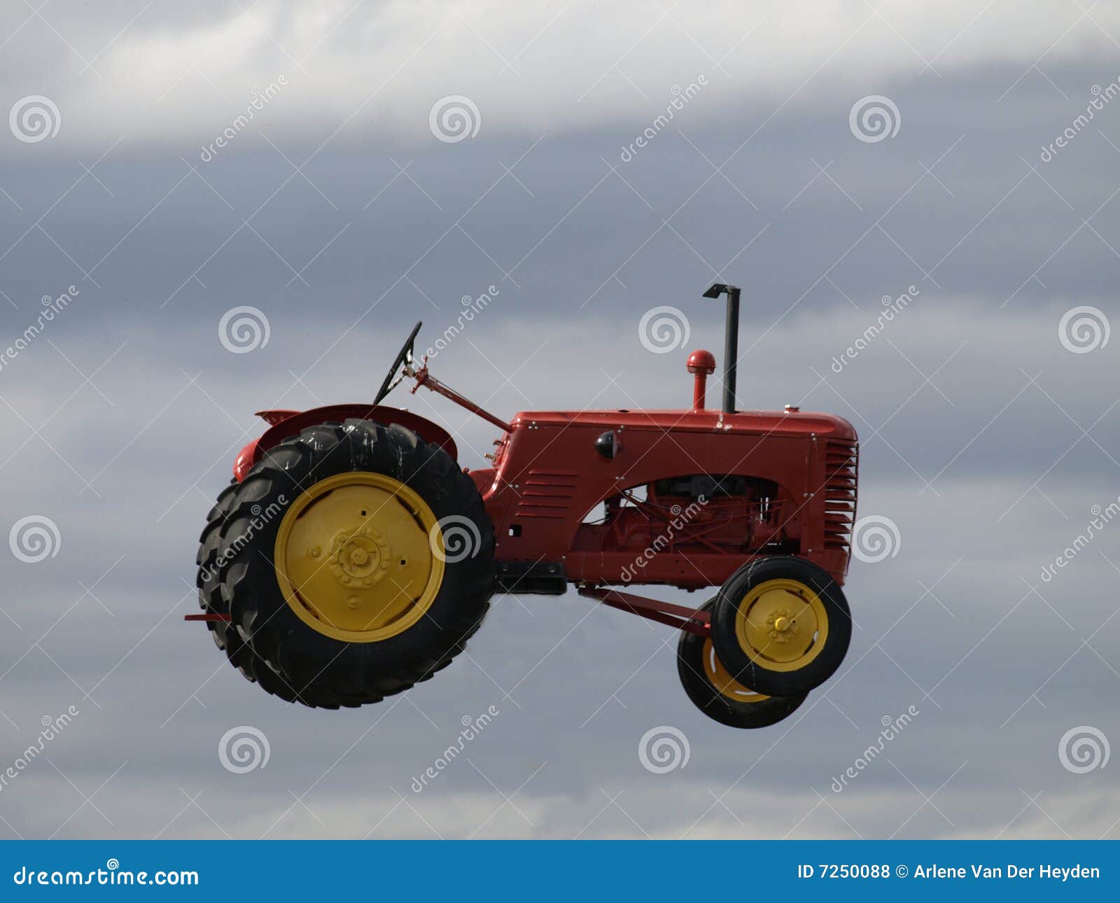 Flying tractor. stock photo. Image of wheel, light, flying - 7250088