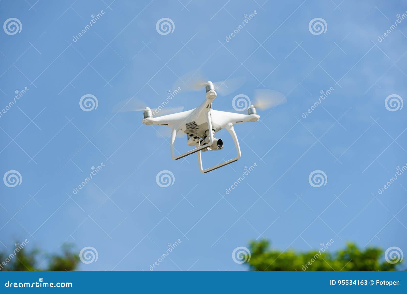 The Unmanned Quadcopter Hovered In The Air. Drone, Quadcopter. Stock ...
