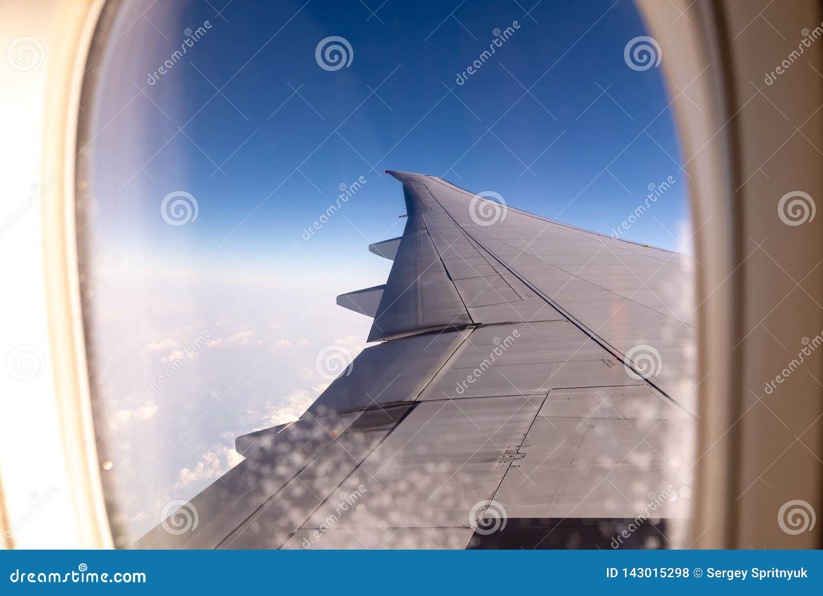 Flying Wing Passenger Aircraft on a Background of Blue Sky and Clouds ...