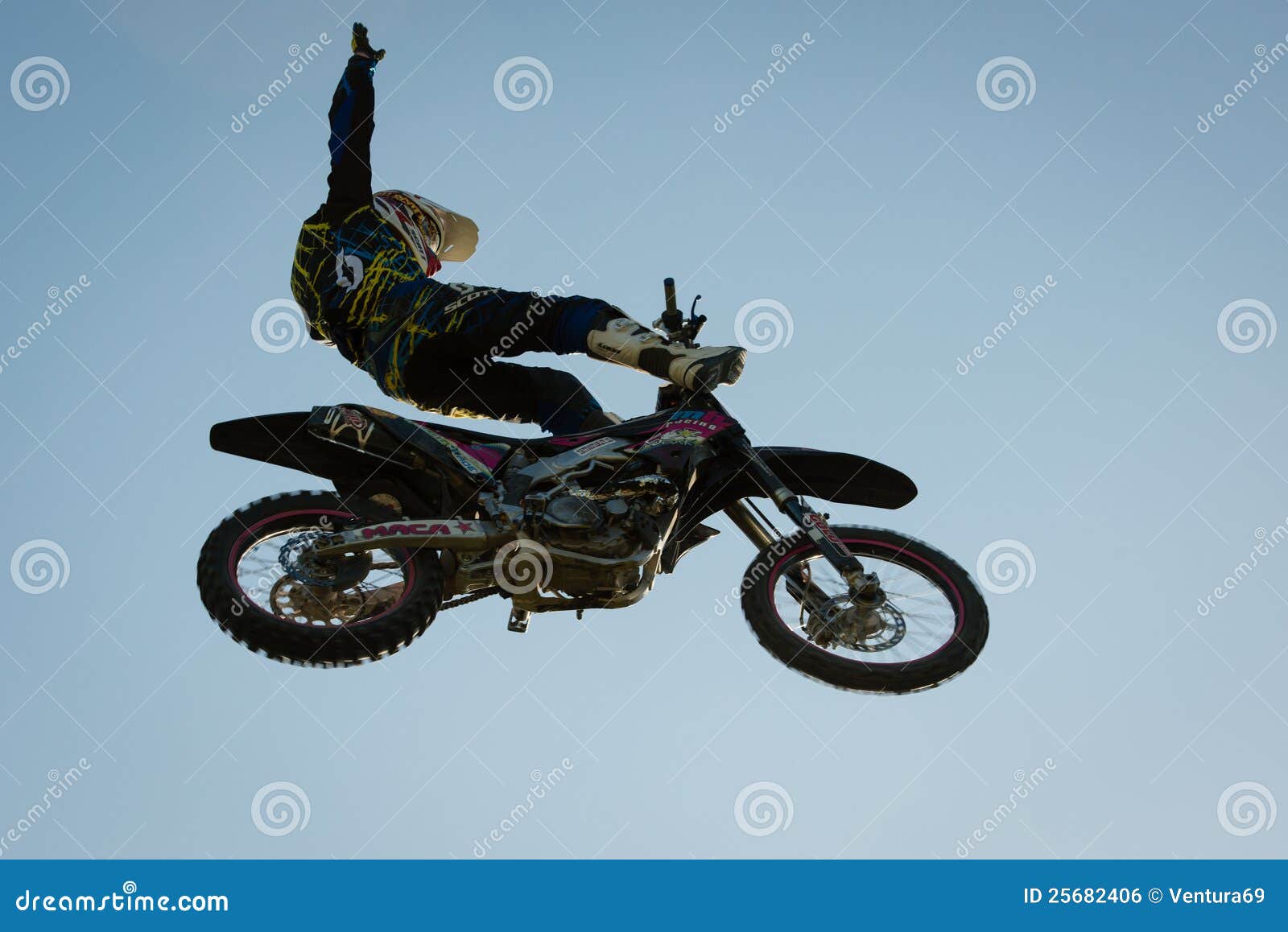 FMX rider performing trick editorial photo. Image of hang - 25682406