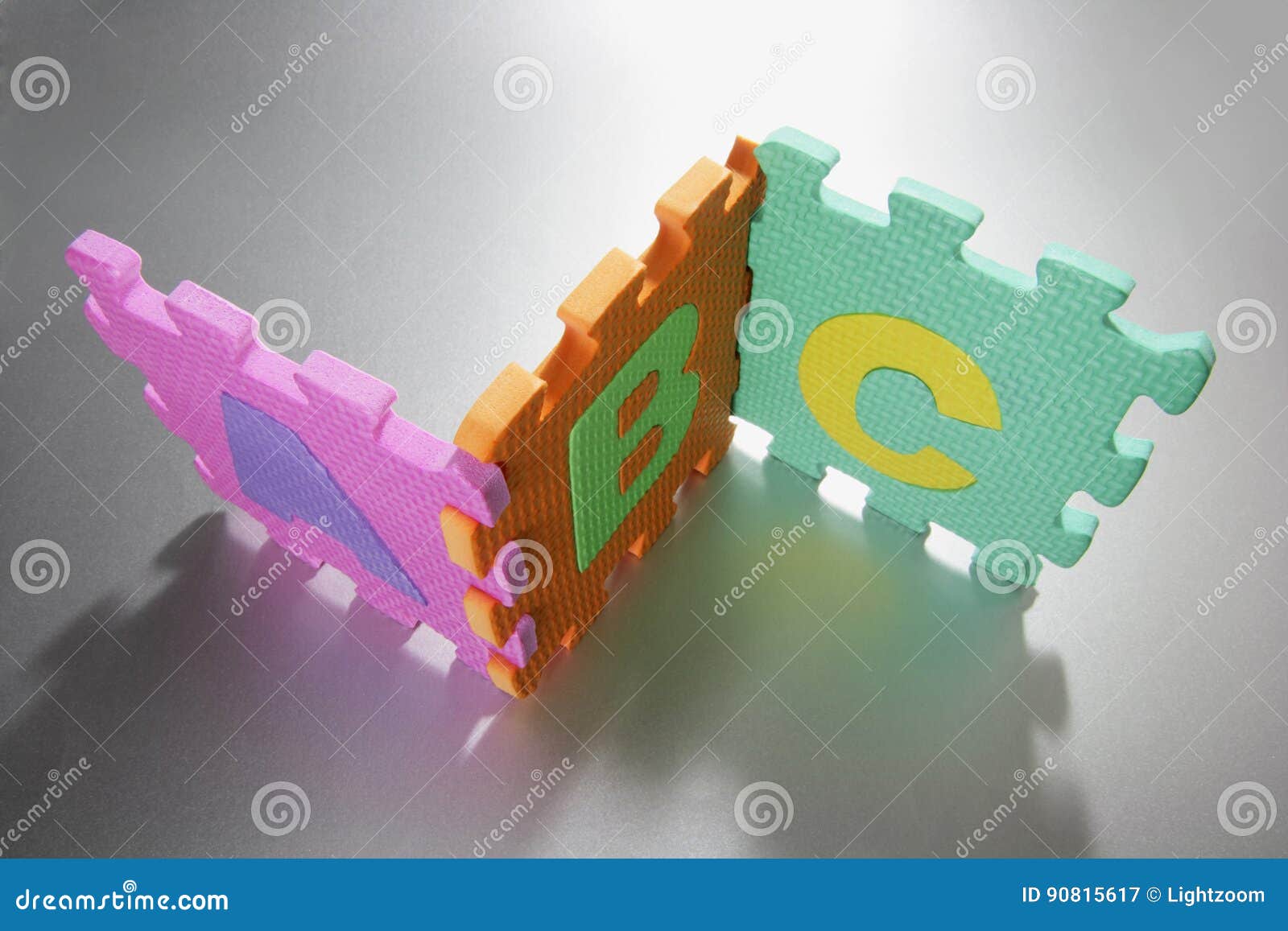 Foam Alphabet Puzzle Mat stock image. Image of concept - 90815617