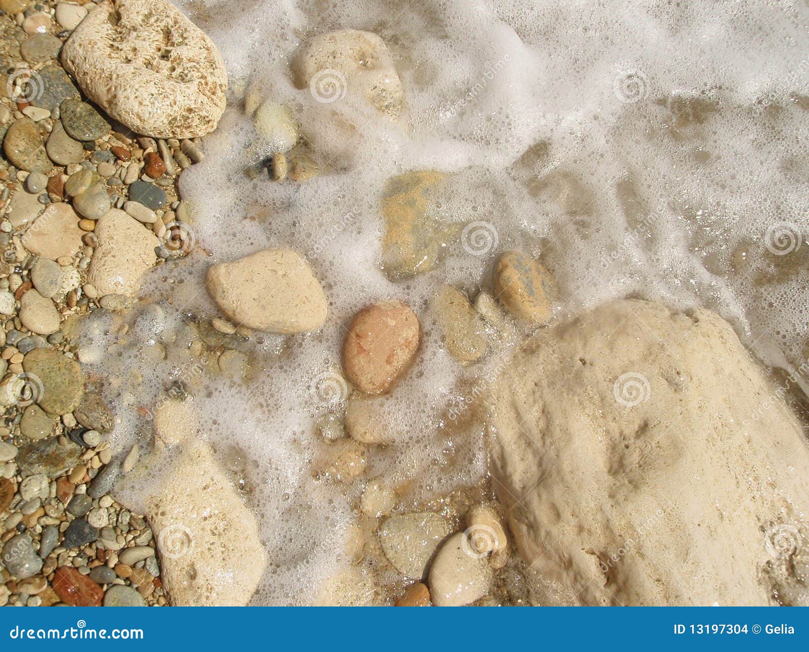 Foam and stones stock photo. Image of shore, stones, surf - 13197304