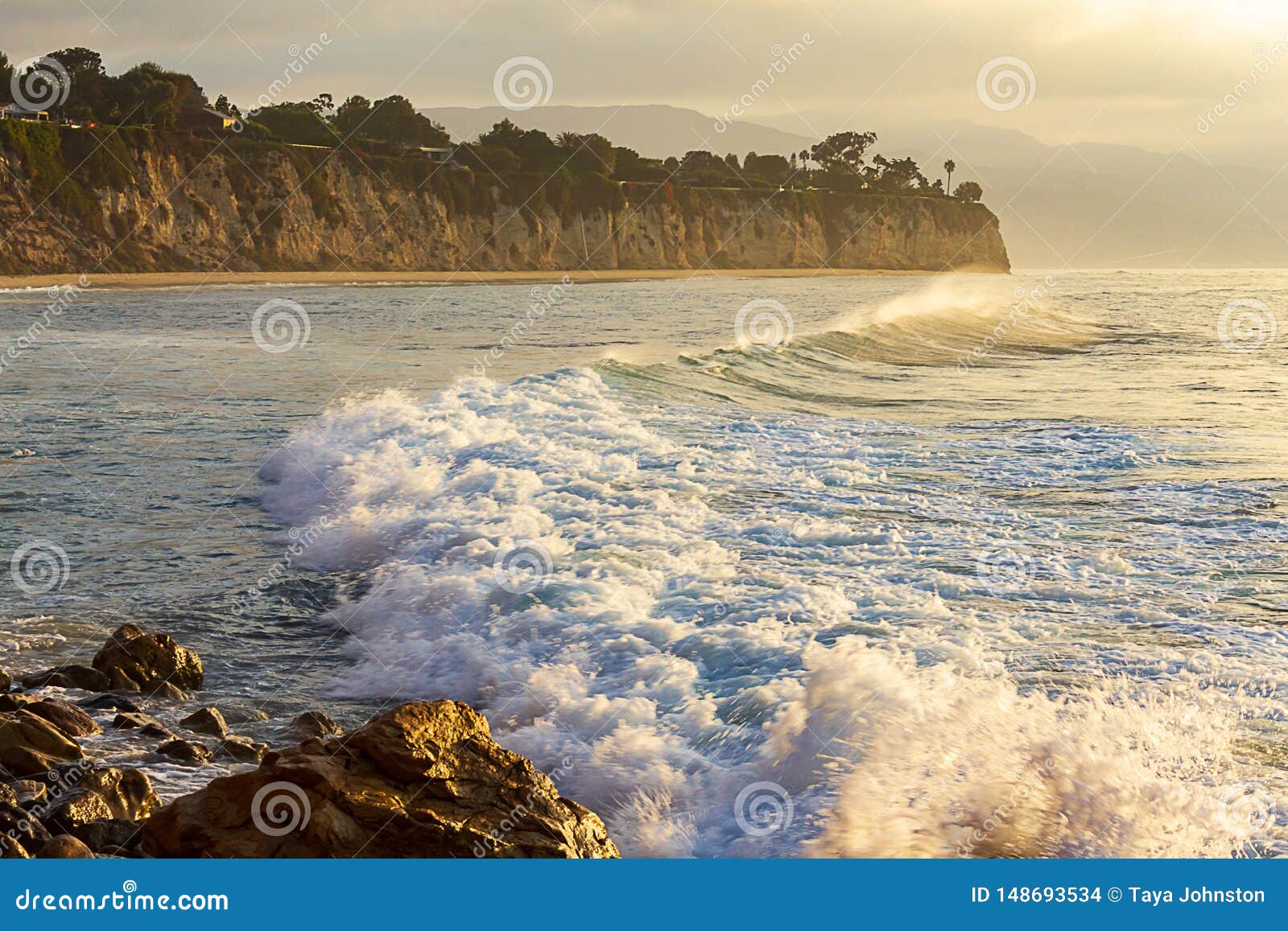 Foaming Wave Breaking at Sunrise with Color Reflection Stock Photo ...
