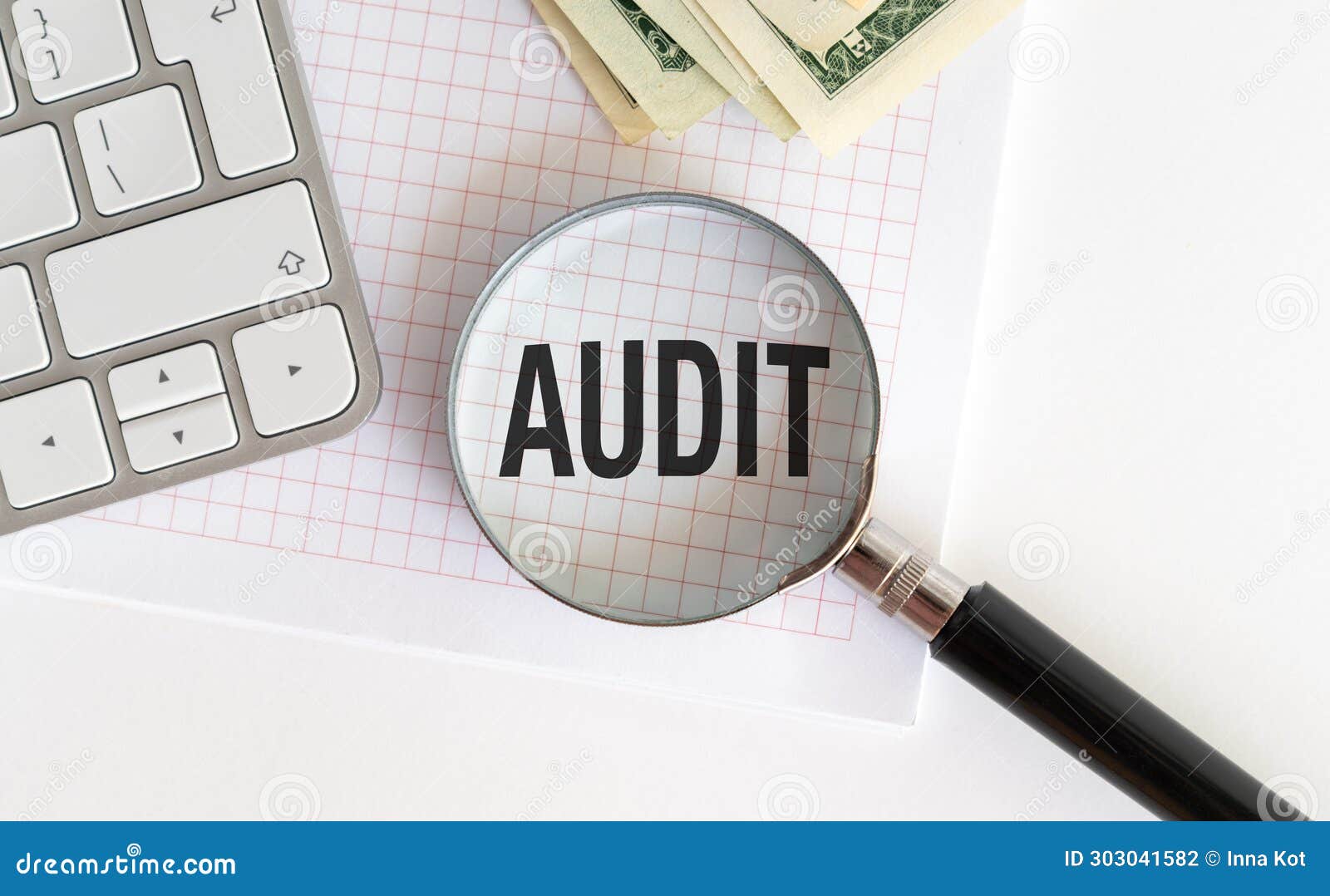 Focus on Audit with Magnifying Glass on the Office Desk. Stock Photo ...